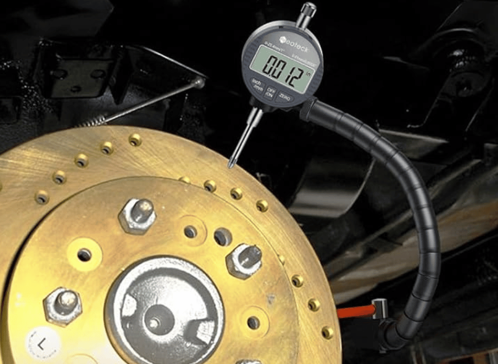 Check Rotor Run Out With a Clamping Dial Indicator